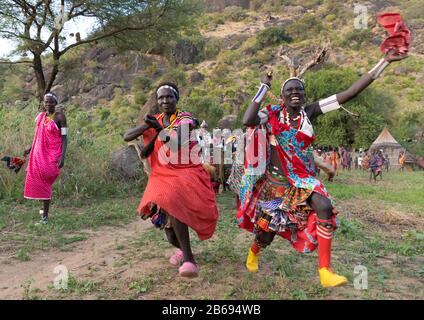 Larim tribe women dancing during a wedding celebration, Boya Mountains ...