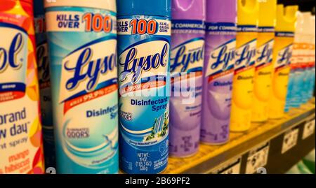 Containers Lysol disinfecting products are seen on a shelf in a ...