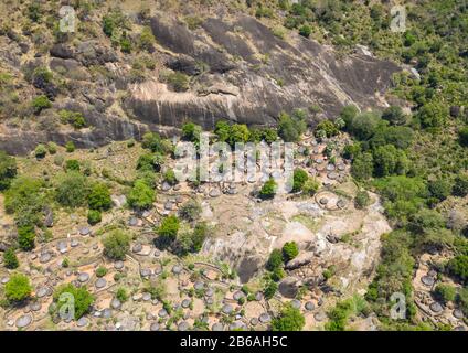Aerial view of a traditional Lotuko tribe village in the mountain ...
