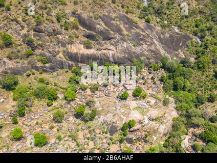 Aerial view of a traditional Lotuko tribe village in the mountain ...