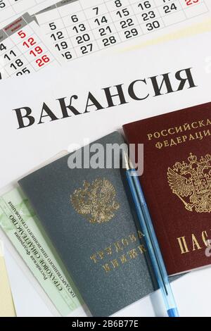Calendar and Russian documents for employment: work book, passport and ...