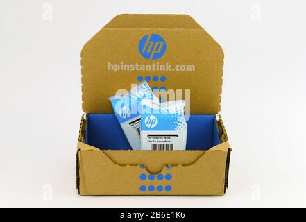 HP Instant Ink box with printer cartridges that you receive by post on ...