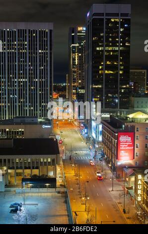 A perspective street view of downtown Denver at dusk. Denver, Colorado ...