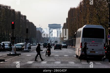 Authentic everyday life in Paris: rush hour traffic on the Champs ...