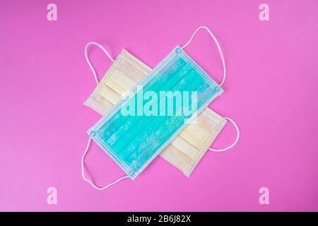 People wear face masks to help curb the spread of the coronavirus as ...