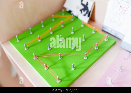 Modern Colorful educational board game for children of pins and rubber ...