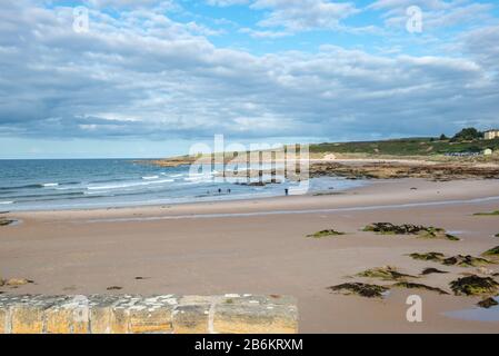 HOPEMAN BAY AND BEACH MORAY COAST SCOTLAND WITH A LONG ROW OF COLOURED ...