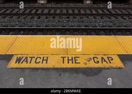 Watch the gap sign at railroad platform edge Westhampton Station Long ...