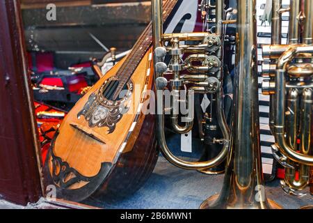 Musical store window with various instruments Stock Photo - Alamy