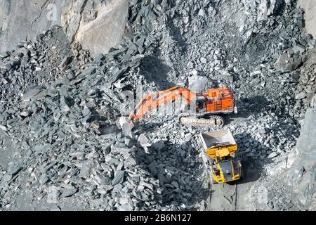 Limestone rocks being extracted from Ingleton Quarry in the Yorkshire ...
