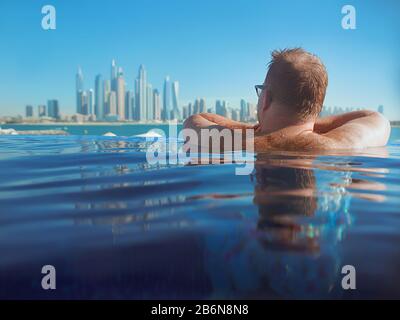 Laser hair removal on back of head of man Stock Photo - Alamy