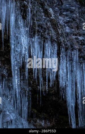 Icicle melt on the rock (close up Stock Photo - Alamy