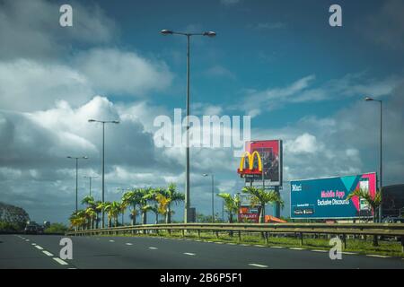 Mauritius island, December 2019 - A MacDonald's logo in the tropical ...
