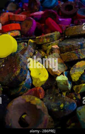 Piles of Art class tempera paint disks Stock Photo - Alamy