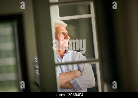 Slanted profile view of serious looking mid adult 40s caucasian self ...