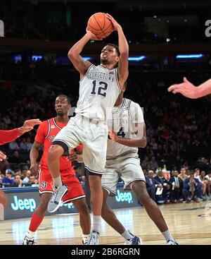 Georgetown guard Terrell Allen (12) handles the ball n front of Seton ...