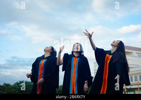 The university graduates having fun and enjoy for degree award in the ...