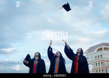 The university graduates having fun and enjoy for degree award in the ...