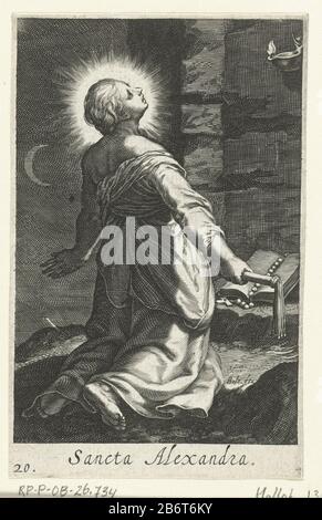 A rosary in an open Bible in French Stock Photo - Alamy