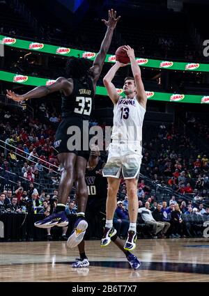 Arizona forward Stone Gettings (13) runs on the court during the first ...