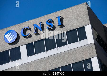A logo sign outside of the headquarters of CNSI in Rockville, Maryland ...