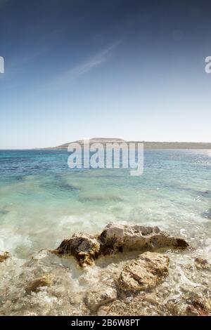 stoney beach in malta looking down the coastline at Maghtab known for ...