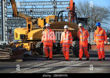 Chancellor Rishi Sunak (right) with Network Rail staff Rob Mcintosh ...