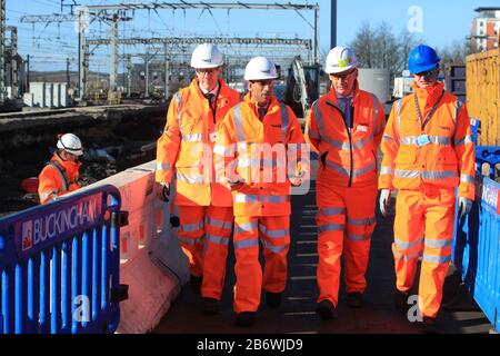 Chancellor Rishi Sunak (right) with Network Rail staff Rob Mcintosh ...