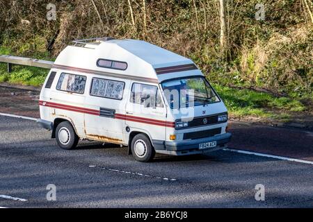 Rusty white conversion van Stock Photo - Alamy