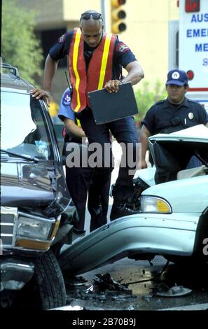 Police at the scene of the car crash in which 29 year old pop star Marc ...