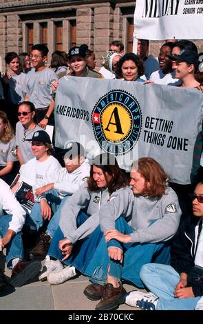 Austin Texas USA, 1998: Workers wearing bunny suits bag computer ...