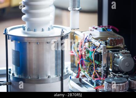 Assembled circuit of electrical relay inside metal case on steel frame ...