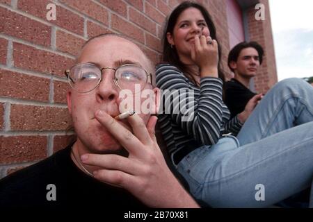 High school students smoking cigarettes Stock Photo - Alamy