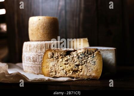 Piece of gorgonzola cheese on baking paper Stock Photo - Alamy