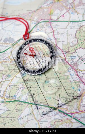 Ordnance Survey Map and a compass Stock Photo - Alamy