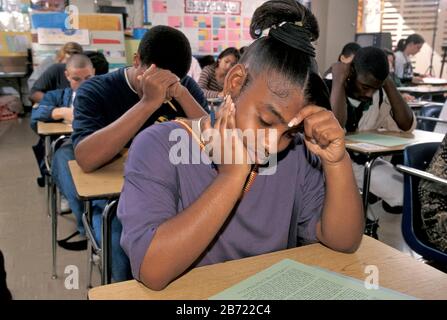 Austin, Texas USA: Black students wearing caps and gowns walk towards ...