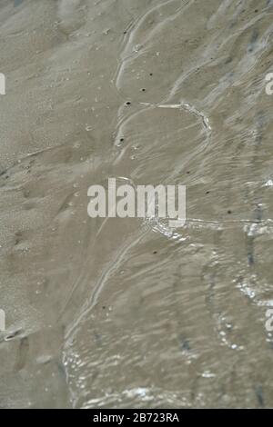 The surf meets the shore Stock Photo - Alamy