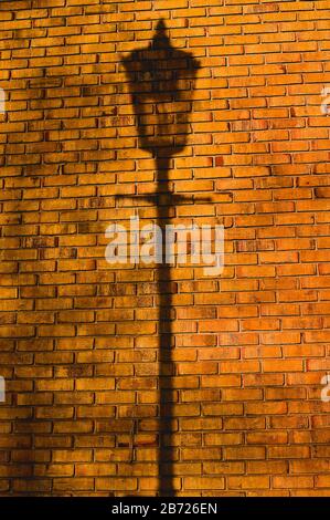 lamp post and shadow Stock Photo - Alamy