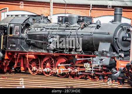 Locomotive shed with electric and diesel locomotives Stock Photo - Alamy