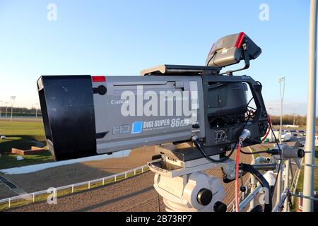 An outside broadcast television cameraman and remote controlled camera ...