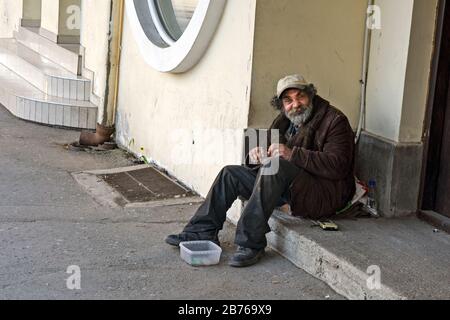 Give me money for food on cardboard sign Stock Photo - Alamy