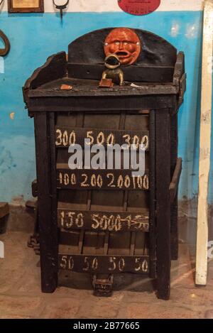 Sapo - a traditional coin-toss game in the andes Stock Photo - Alamy