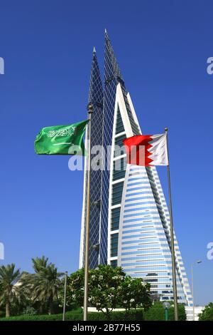 The national flag of Bahrain and Bahrain World Trade Centre.f Stock ...