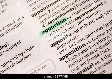 Apportion word or phrase in a dictionary Stock Photo - Alamy