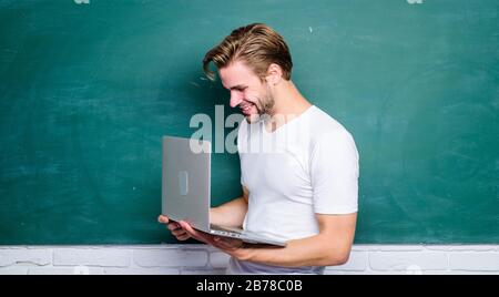Student learn programming language. Handsome man use modern technology ...