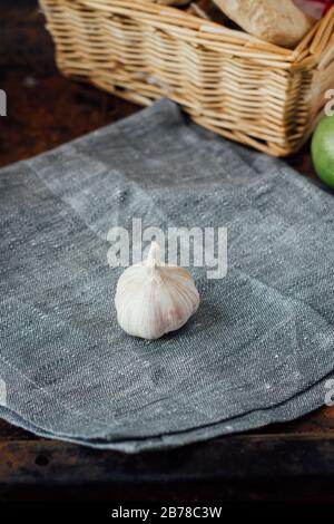 Nice garlic on piece of fabric material Stock Photo - Alamy