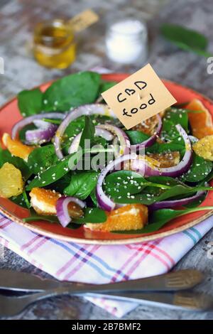 A note with the words cbd food in a salad with cabbage. Cbd food ...