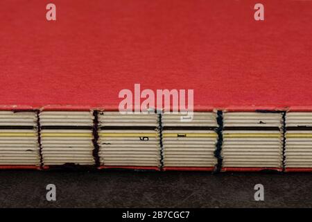vintage style wire-bound book closeup view Stock Photo - Alamy