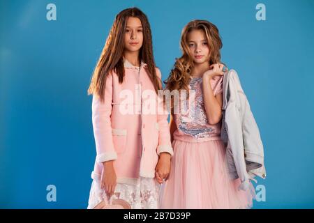 Young tween girl with trendy pink hair and crop top showing her abs has ...