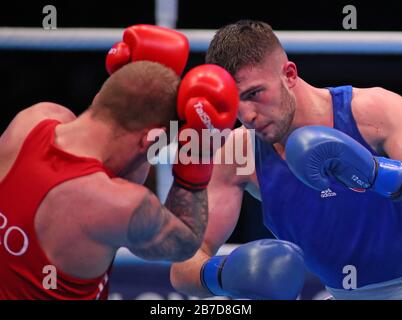 Luka Plantic of Croatia, wearing red and Umar Dzambekov of Austria ...